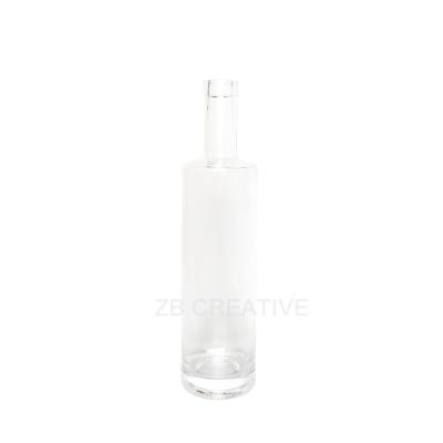 China 700ml Clear Heavy Base Glass Liquor Bottle with Cork Top for Premium Spirits Packaging for sale