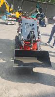 China Mini Skid Steer Loader 380kg Load Capacity 15kW Diesel Engine Wheel Loader for Compact Construction for sale