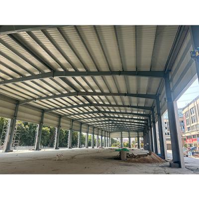 China Modular Steel Buildings Steel Frame Construction Prefabricated Warehouse Building for sale