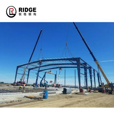 China Turnkey Steel Structure Warehouses – From Design to Erection, with Integrated Crane & Mezzanine Options for sale