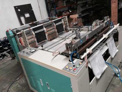 China Cheap Plastic Packing Machine T Shirt Bag Making Machine for sale