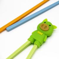 China Silicone Pig Shaped Tableware Helper Chopsticks Holders Chopsticks Head For Kids for sale