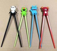 China Kids Reusable Silicone Cartoon Learning Training Chopsticks With Holders for sale