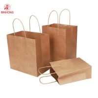 China Reusable Flat Handle Flexo Printing Kraft Paper Carry Bags for sale