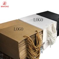 China Oil Proof Coated Paper 80gms Twisted Handle Bags for sale