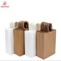 China Glued 30cm Paper Standing Pouch With Twisted Handles for sale