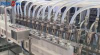 China Aseptic Filling Machine for Animal Vaccine in Round Plastic Bottles with 12 Groups of 316L Piston Pumps for sale