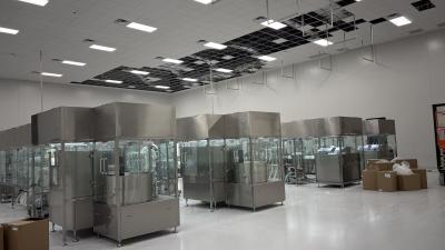 China 12 Filling Heads Animal Vaccine Filling Machine with PLC Bus Control and HEPA Filter System for Round Plastic Bottles for sale