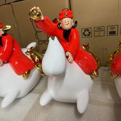 China Glossy Coating FRP Statues God Of Wealth Riding Horse May Fortune Come Immediately for sale