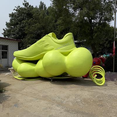 China FRP Statue Giant Fluorescent Yellow Sneaker Fiberglass Shoe Sculpture Commercial Mall Art Display for sale
