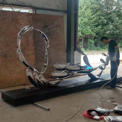China 304 Stainless Steel Sculpture Mirror Polished School Of Fish Outdoor Waterscape Metal Statue for sale