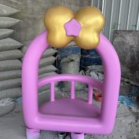 China Amusement Park Outdoor Landscape Sculptures Cartoon Bow Kids Photo Chair Prop for sale