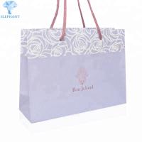 China Portable Kraft Paper Bags With Rope Handles Glossy Lamination for sale