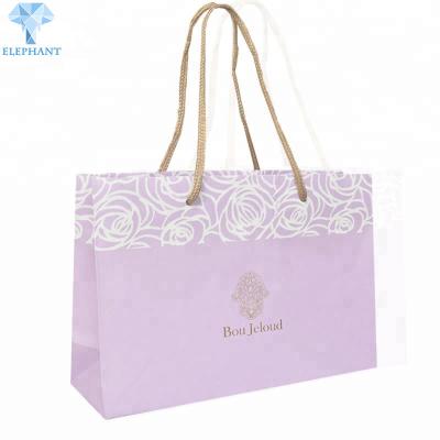 China Portable Kraft Paper Bags With Rope Handles Glossy Lamination for sale