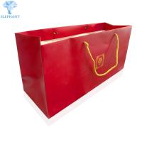 China Red Gift Bags With Handles 18×13×7cm Recycled Paper Merchandise Bags for sale