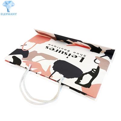 China Eco Friendly CMYK Paper Shopping Bags With Handles Foil Stamping for sale