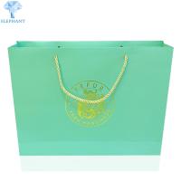 China Green C2S Art Paper Gift Bags With Handles Biodegradable for sale