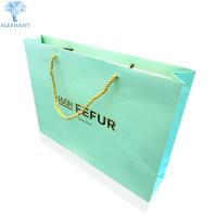 China Green C2S Art Paper Gift Bags With Handles Biodegradable for sale
