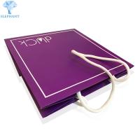 China Luxury Hot Stamping Kraft Paper Gift Bags With Handles PMS Printing for sale