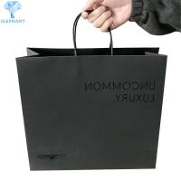 China Heavy Duty Printed Paper Carrier Bags 20×21×8cm Matte Black Gift Bags for sale