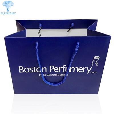 China Wholesale Custom Logo White High Quality Cheaper Paper Gift Bags With Handles for sale
