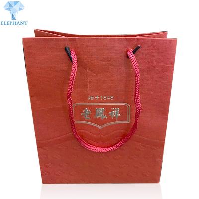 China Custom Jewelry Free Sample Wedding Door Red Paper Gift Bags With Handles for sale
