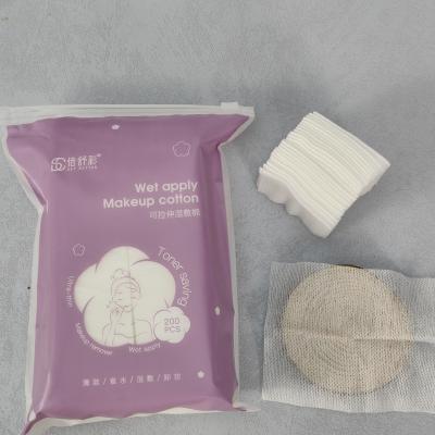 China Stretchable Wet Compress Cotton Makeup Moisturizing Face Cotton Pad for sale