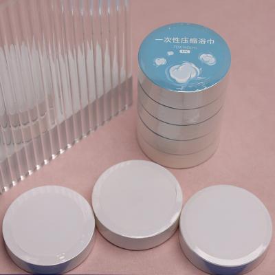 China Viscose Round Disposable Compressed Bath Towel Quick Dry 40gsm for sale