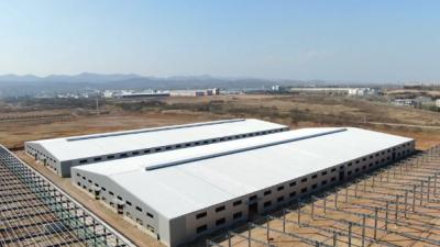 China Prefab Steel Warehouse Building Gable Frame Structure Customizable Wall Cladding ISO9001 for sale