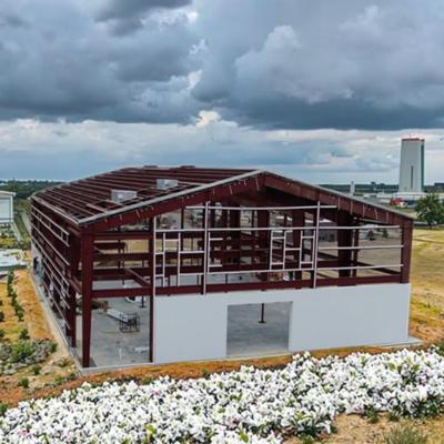 China Prefabricated Steel Warehouse Building 30m Wide Span with Wall Cladding Options for sale