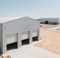 China Prefabricated Steel Warehouse Building Q345 Steel Frame 30m Span Customizable Industrial Workshop for sale
