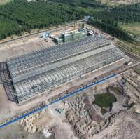 China Prefabricated bolt‑assembled steel‑frame building industrial workshop logistics warehouse plant with crane beam mezzanine floor skylight and drainage system for industrial construction for sale