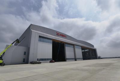China Truss‑type Steel Hangar Building Aircraft Storage Premise Roof Purlin System Large Custom Door Opening Pre‑fabricated Steel Members for sale