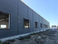 China Prefabricated Steel Structure Workshop Warehouse 10-50m Span Q355B Anti-Rust Industrial Building for sale