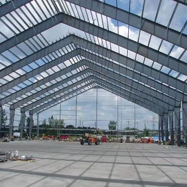 China Export Grade Steel Structure Warehouse Industrial Workshop Prefab Light Steel Frame 60m Clear Span 15m Eave Height for sale