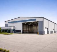 China Prefab Steel Warehouse Building H Section Steel Frame 600sqm Customizable Industrial Storage for sale