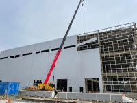 China Steel purlin and column framework building customizable layout heavy‑duty crane base suitable for manufacturing workshop raw‑material warehouse for sale