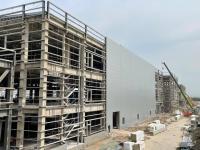 China Steel purlin and column framework building customizable layout heavy‑duty crane base suitable for manufacturing workshop raw‑material warehouse for sale