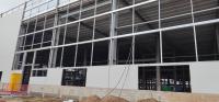 China Steel purlin and column framework building customizable layout heavy‑duty crane base suitable for manufacturing workshop raw‑material warehouse for sale
