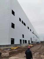 China Pre‑manufactured steel frame components field installation factory building food‑processing plant stock warehouse transit logistics station for sale