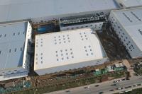 China Modular pre‑drilled steel frame construction assembled‑on‑site industrial plant multi‑function workshop logistics storage house with matched building accessories for sale