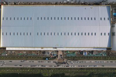 China Pre‑manufactured steel frame components field installation factory building food‑processing plant stock warehouse transit logistics station for sale