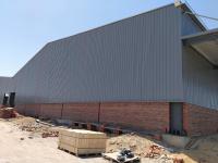 China Low Cost Prefabricated Steel Workshop Building Wide Span Structural Steel Warehouse for Logistics Distribution Center for sale
