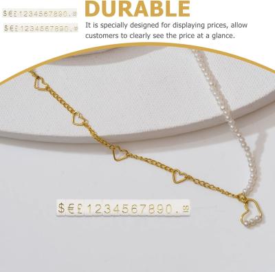 China Metal Tag Assembly Blocks for Dollar Numeral Cubes Rings Stick Combined Number Digit Sign Jewelry Display Racks for sale