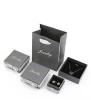 China Gray Bow Specialty Hard Paper Packing Jewelry Boxes For Earrings Ring Gift Box for sale