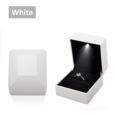 China LED Lighted White Piano Finish Jewelry Ring Packaging Box with Baking Paint and Flannelette Lining for sale