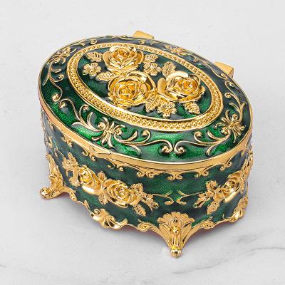 China 8.9x5.9cm Gold Green Rose Enamel Oval Metal Jewelry Storage Organizer Box with Zinc Alloy Material for sale