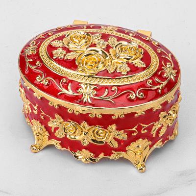 China Gold Red Rose Enamel Oval Metal Jewelry Storage Organizer Box Zinc Alloy Material With Polished Finish for sale