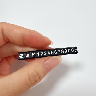 China Black Plastics 5x3mm Mini Triangular Jewellery Price Cubes for Elegant Price Display for sale
