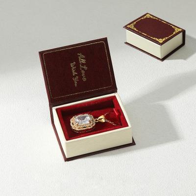 China Vintage Book Style Mini Pendant Box in Synthetic Leather Paper for Jewelry Gift Organizer 4.0 × 5.6 × 2.2 cm for sale